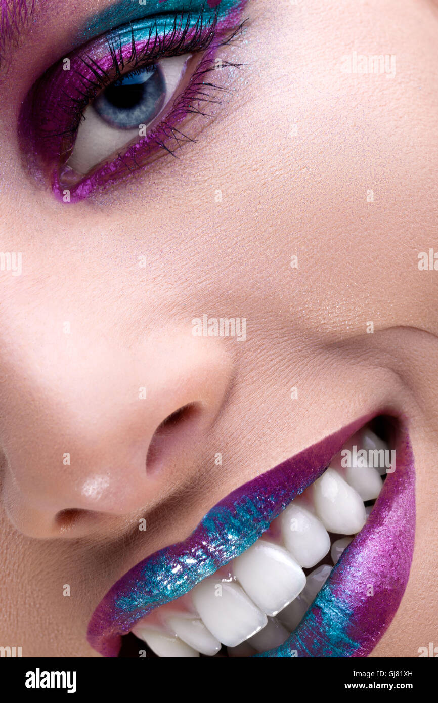 beauty Close up, woman, mauve lips, view to the camera, mouth opened a ...