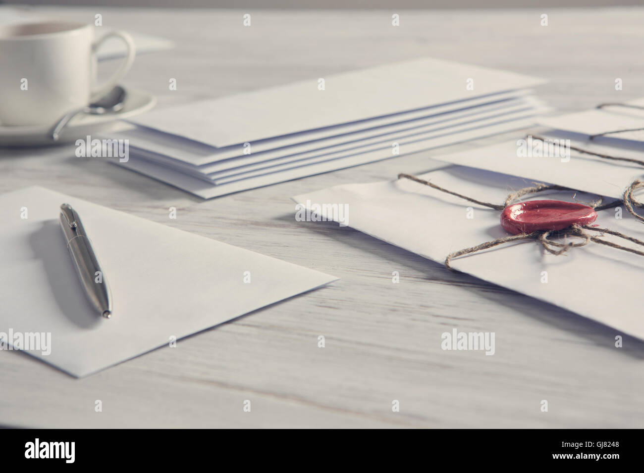 Letters with seal on table Stock Photo - Alamy