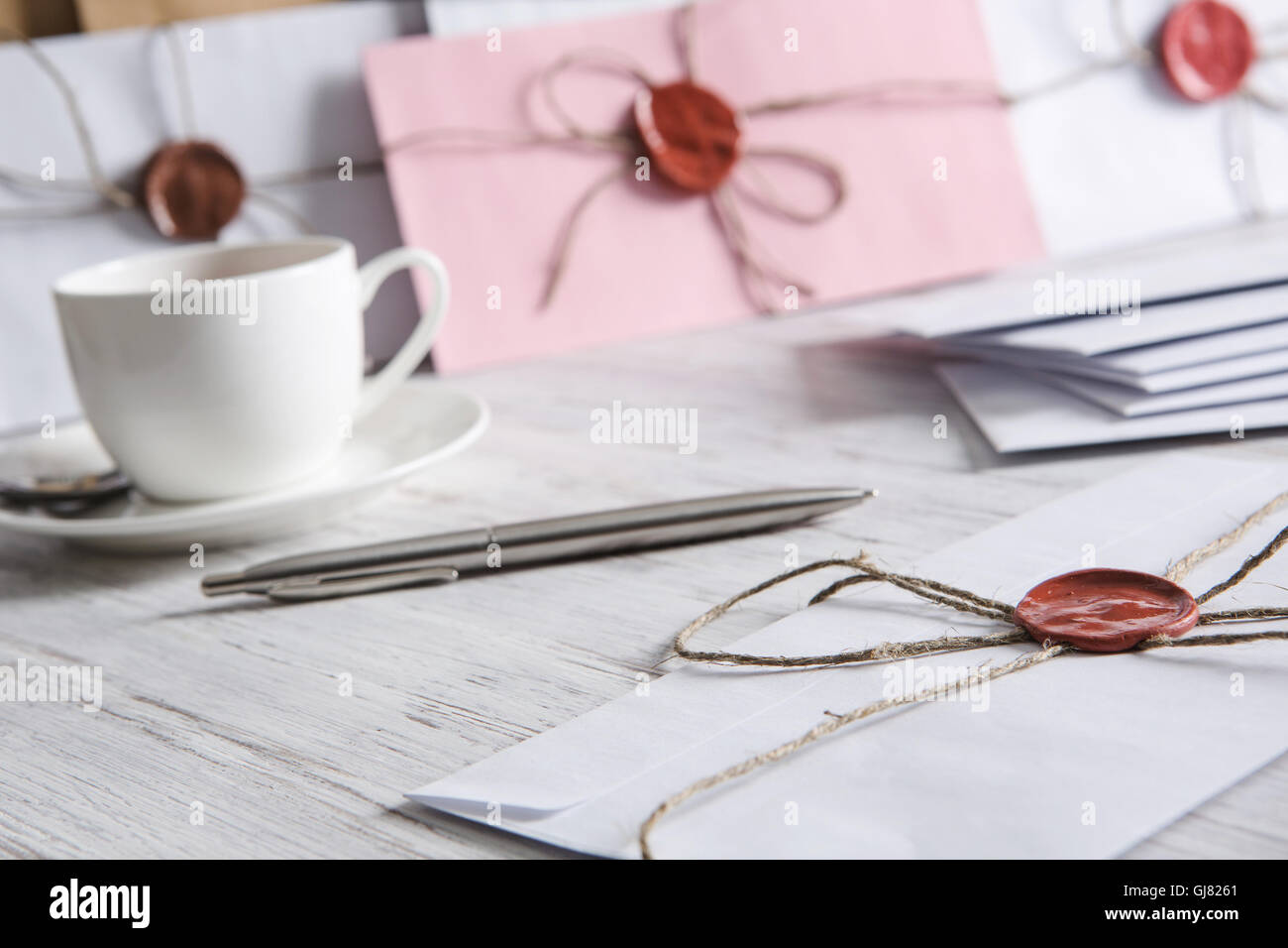 Letter with seal on table Stock Photo - Alamy