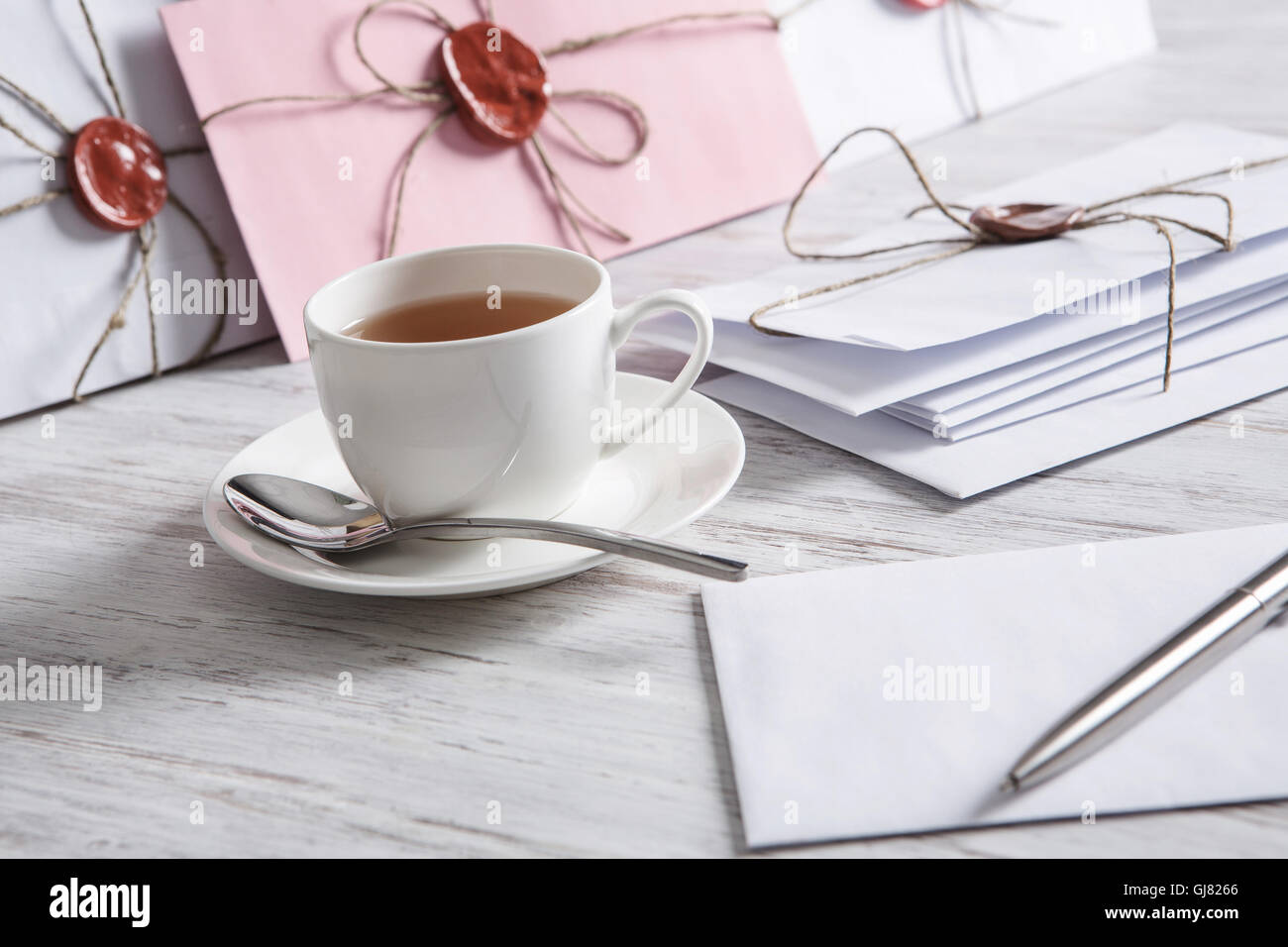 Letter with seal on table Stock Photo - Alamy