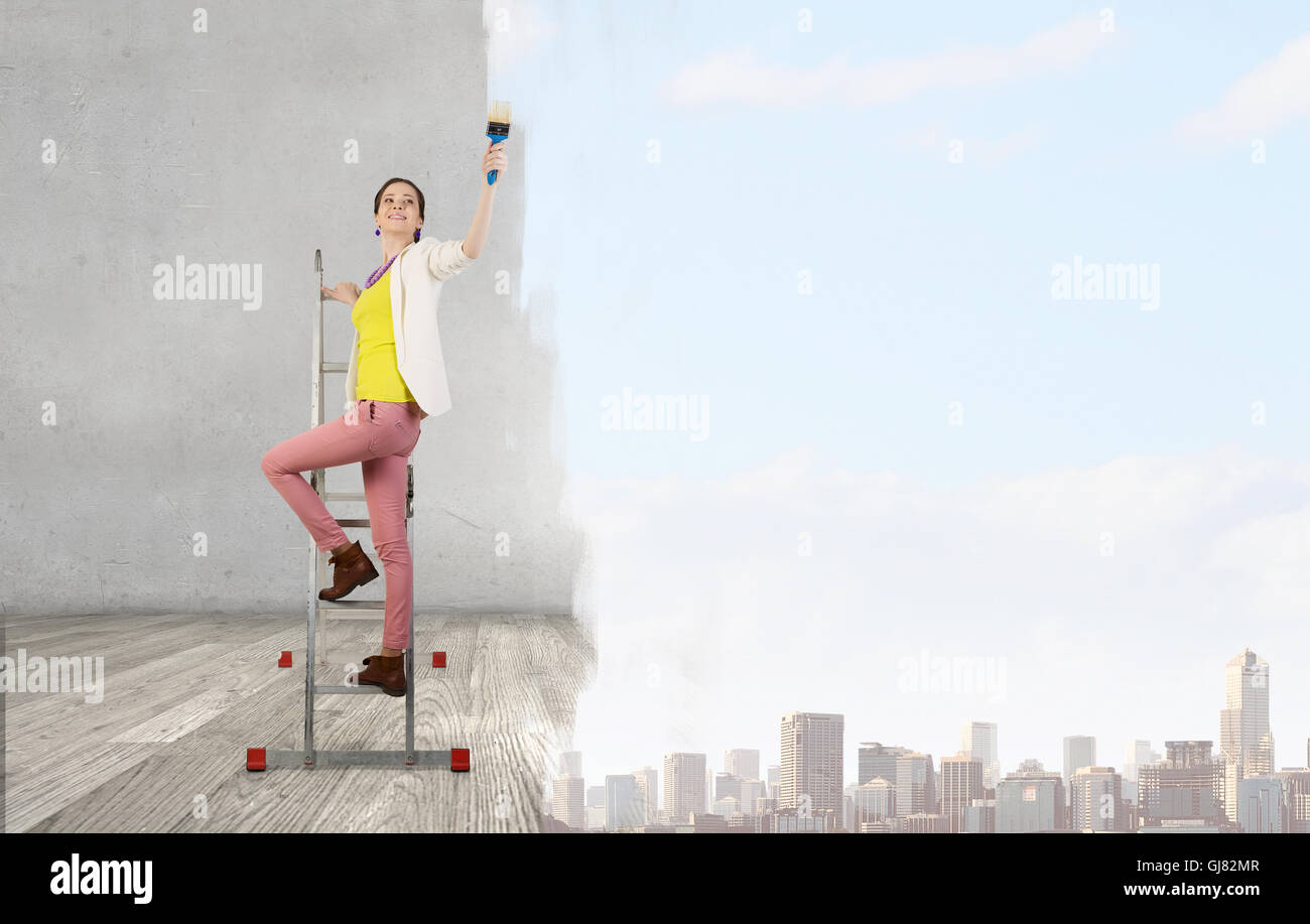 She paints her life in colors . Mixed media Stock Photo - Alamy
