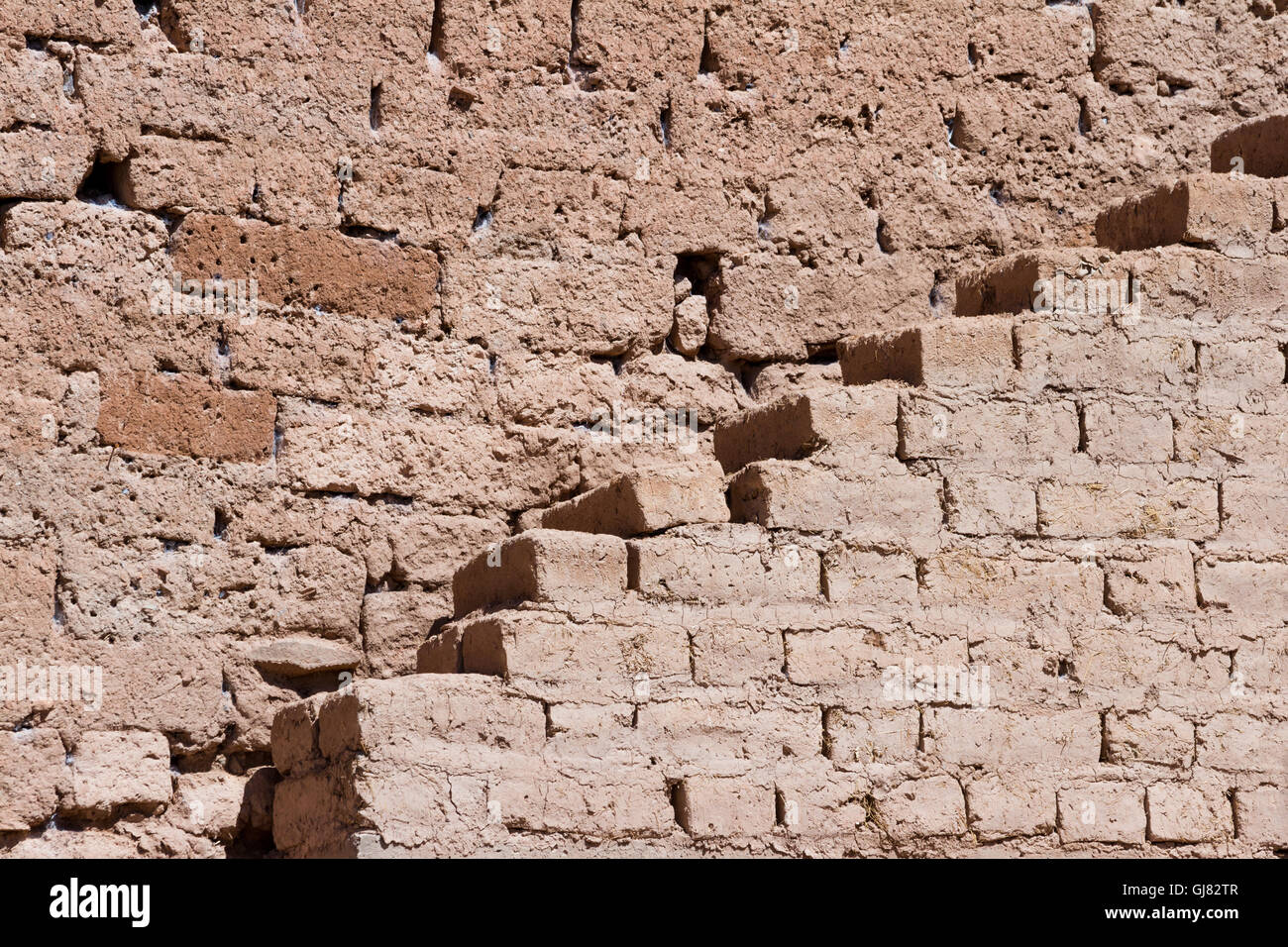 close up of a set of steps build out of mud brick in the city of Maras ...