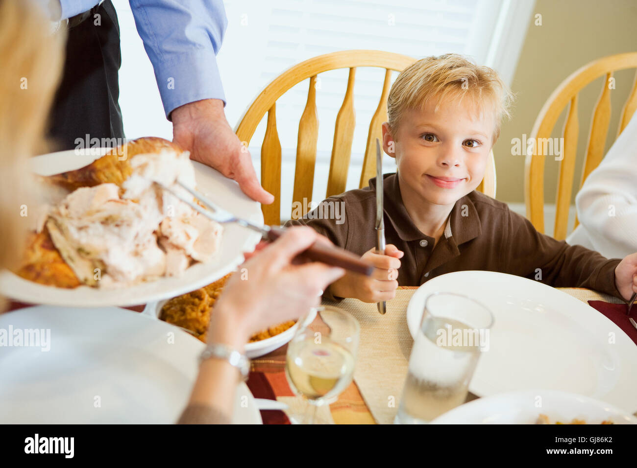 Traditional Thanksgiving holiday in the USA, with family preparing ...