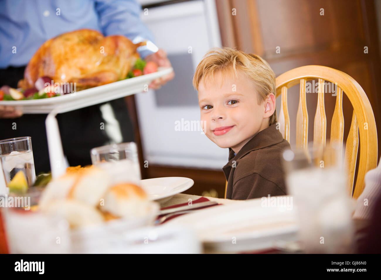 Traditional Thanksgiving holiday in the USA, with family preparing ...
