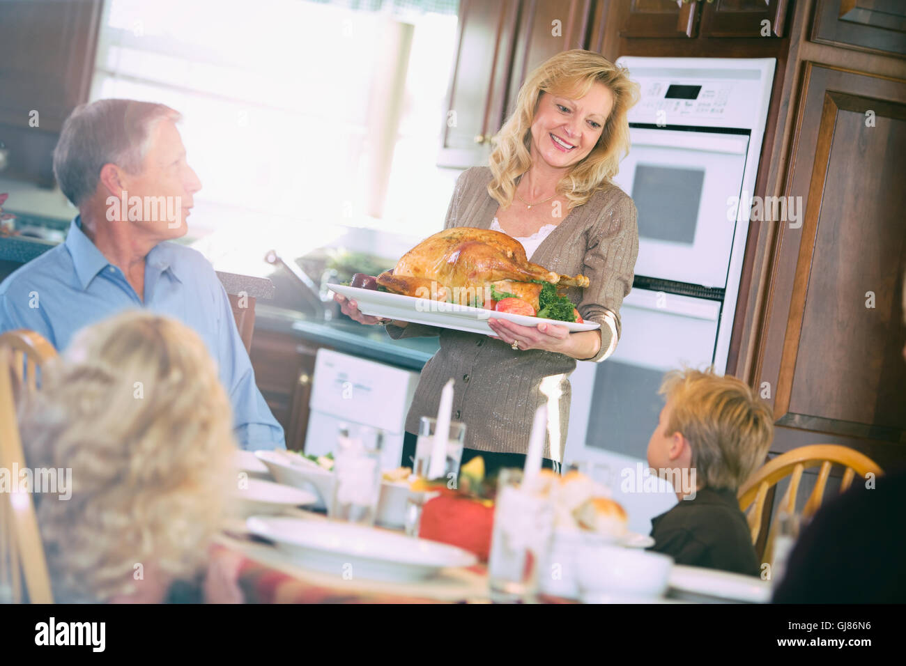 Traditional Thanksgiving holiday in the USA, with family preparing ...