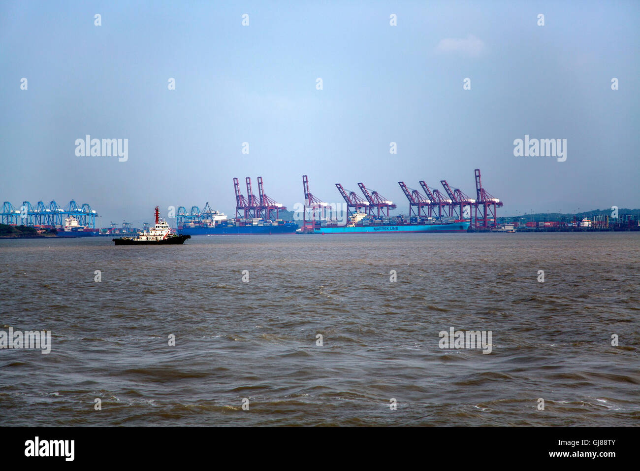 MUMBAI, INDIA - OCTOBER 11, 2015: Cargo ship at Jawaharlal Nehru Port ...