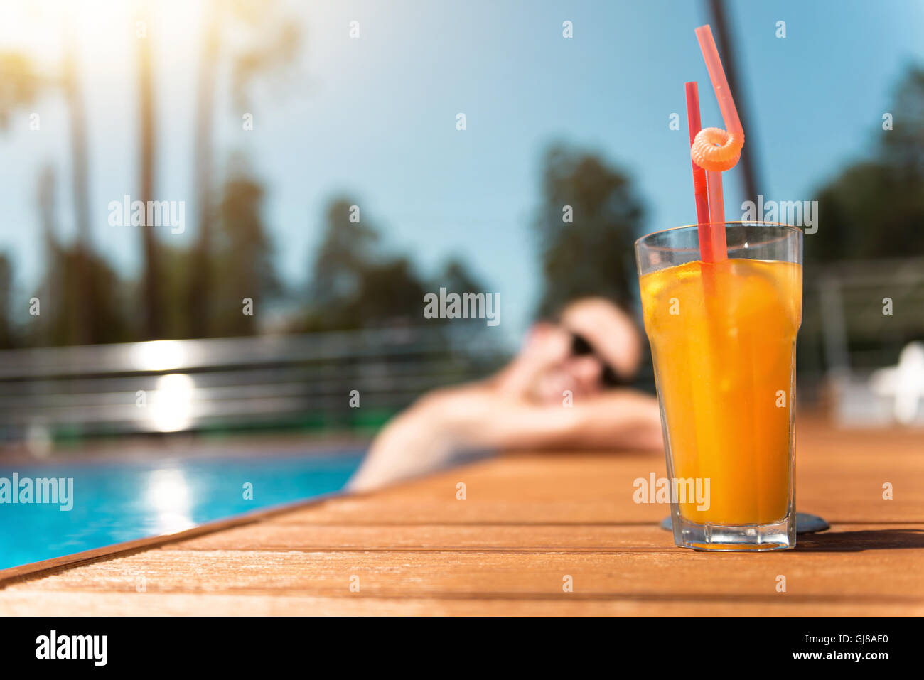 Man standing near swimming pool hi-res stock photography and images - Alamy