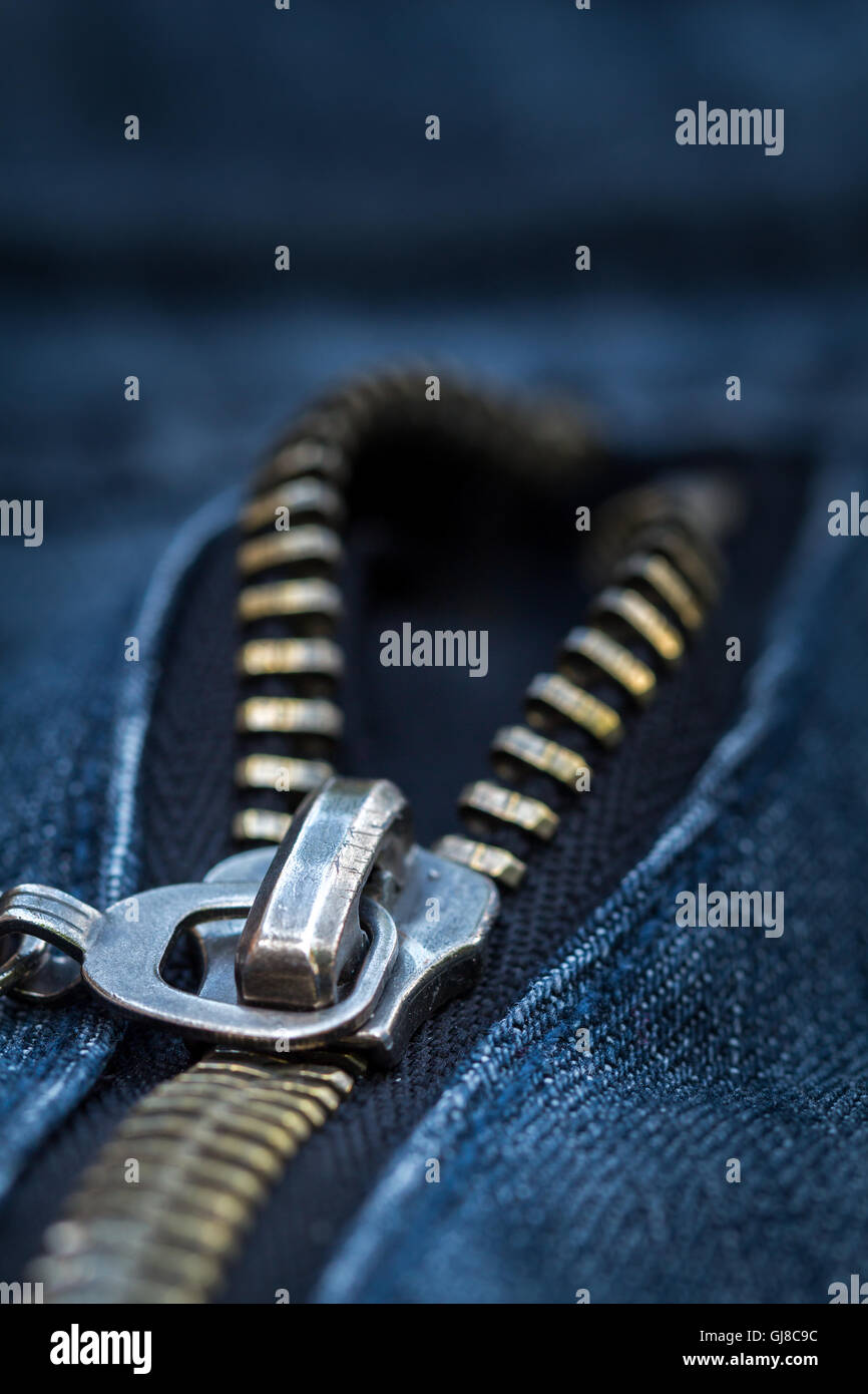 Close up and detailed shot of a metallic zip on denim Stock Photo - Alamy