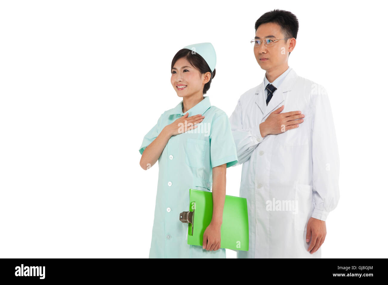 Cooperation two male doctors wearing hi-res stock photography and ...