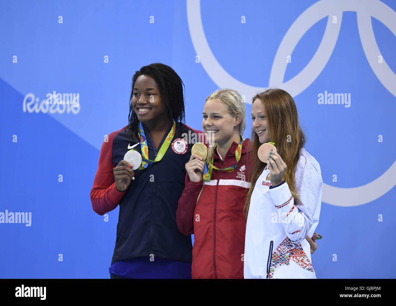 Rio De Janeiro, Brazil. 13th Aug, 2016. Pernille Blume of Denmark (C ...