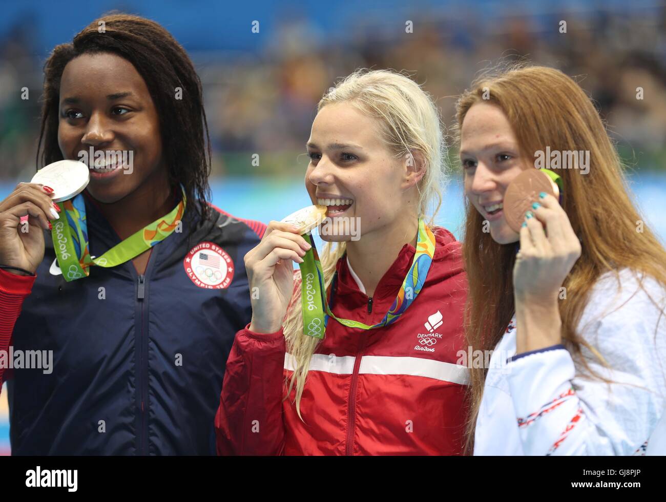 Rio De Janeiro, Brazil. 13th Aug, 2016. Pernille Blume of Denmark (C ...