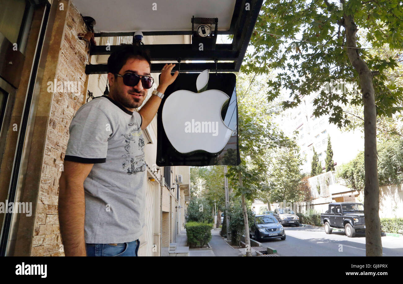 Teheran, Iran. 13th Aug, 2016. The owner of an Apple store where he ...