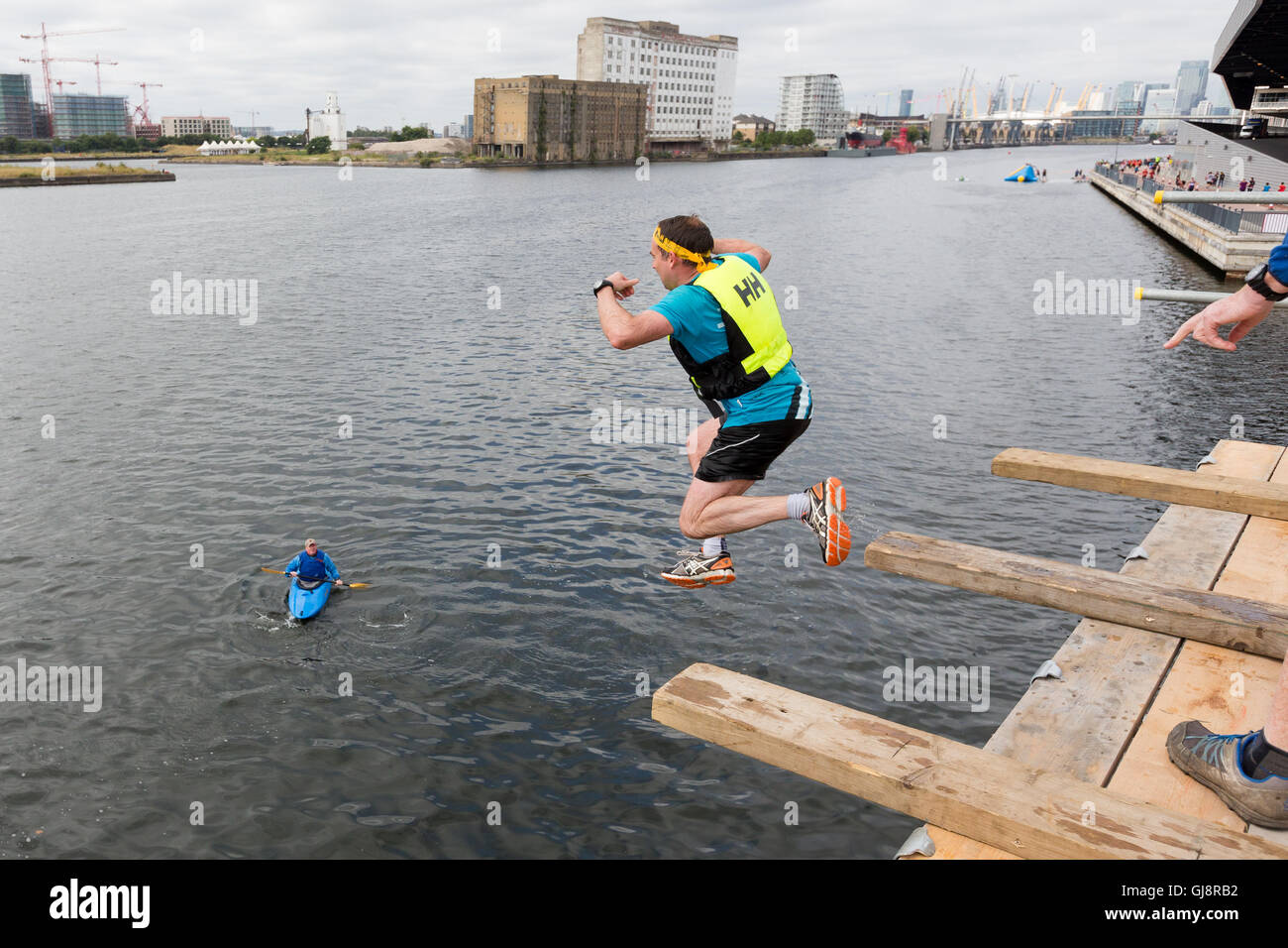Royal london docks open water swimming hi-res stock photography and ...