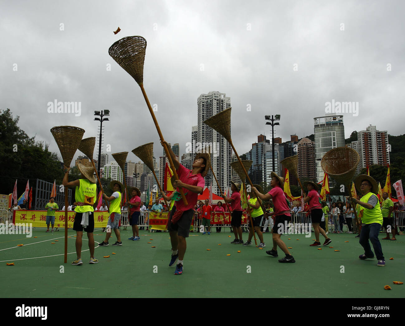 August 14, 2016 - A team of men participating in the game of QIANG GU ...
