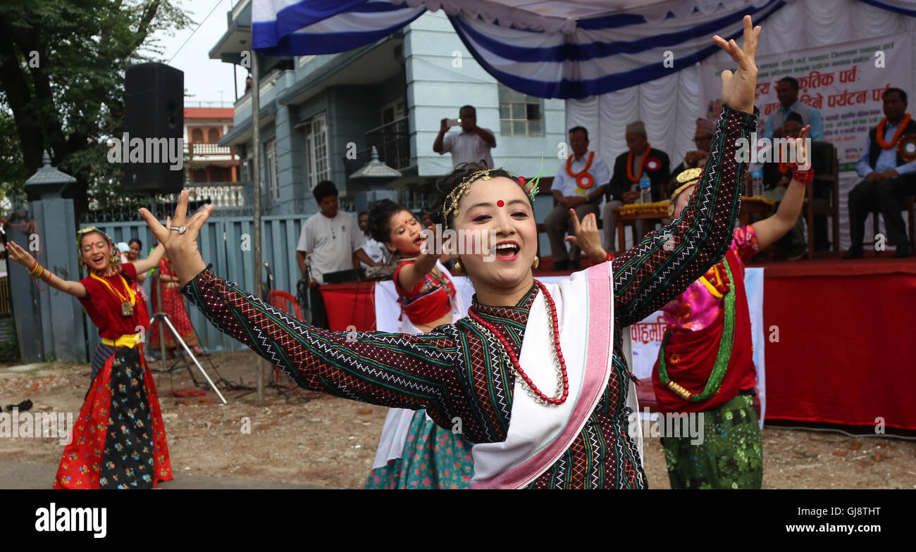Kathmandu, Nepal. 14th Aug, 2016. Performers dressed up in traditional ...