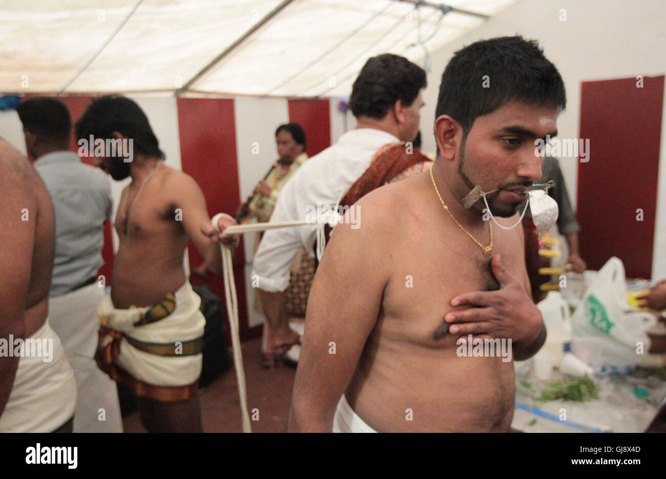 Ealing, London, UK. 14th Aug, 2016. A devotee wearing a Vels (a skewer ...