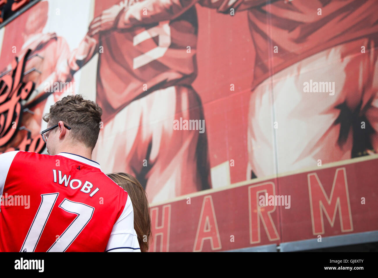 Emirates Stadium, North London, UK. 14th Aug, 2016. Football fans at ...