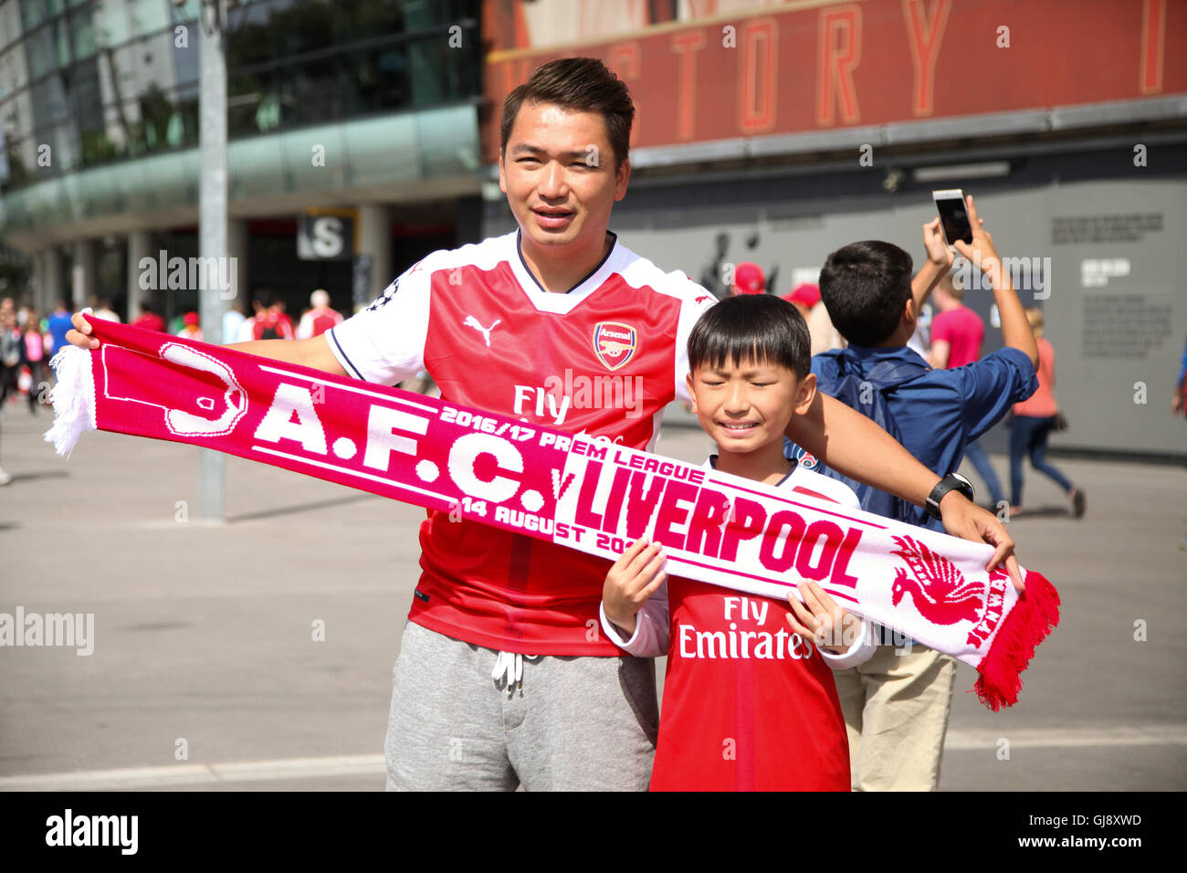 Emirates Stadium, North London, UK. 14th Aug, 2016. Football fans at ...