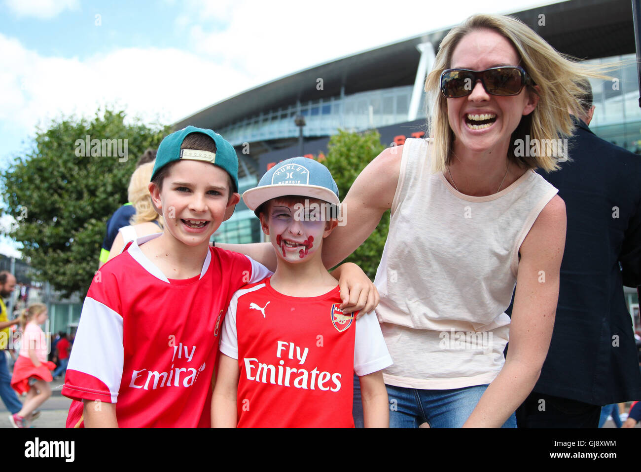 Emirates Stadium, North London, UK. 14th Aug, 2016. Football fans at ...