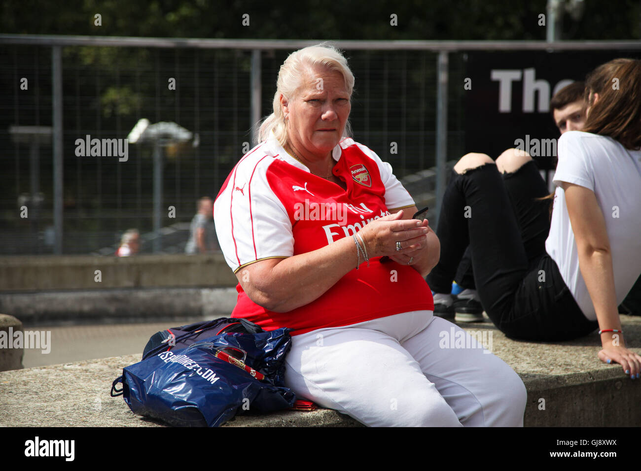 Emirates Stadium, North London, UK. 14th Aug, 2016. Football fans at ...