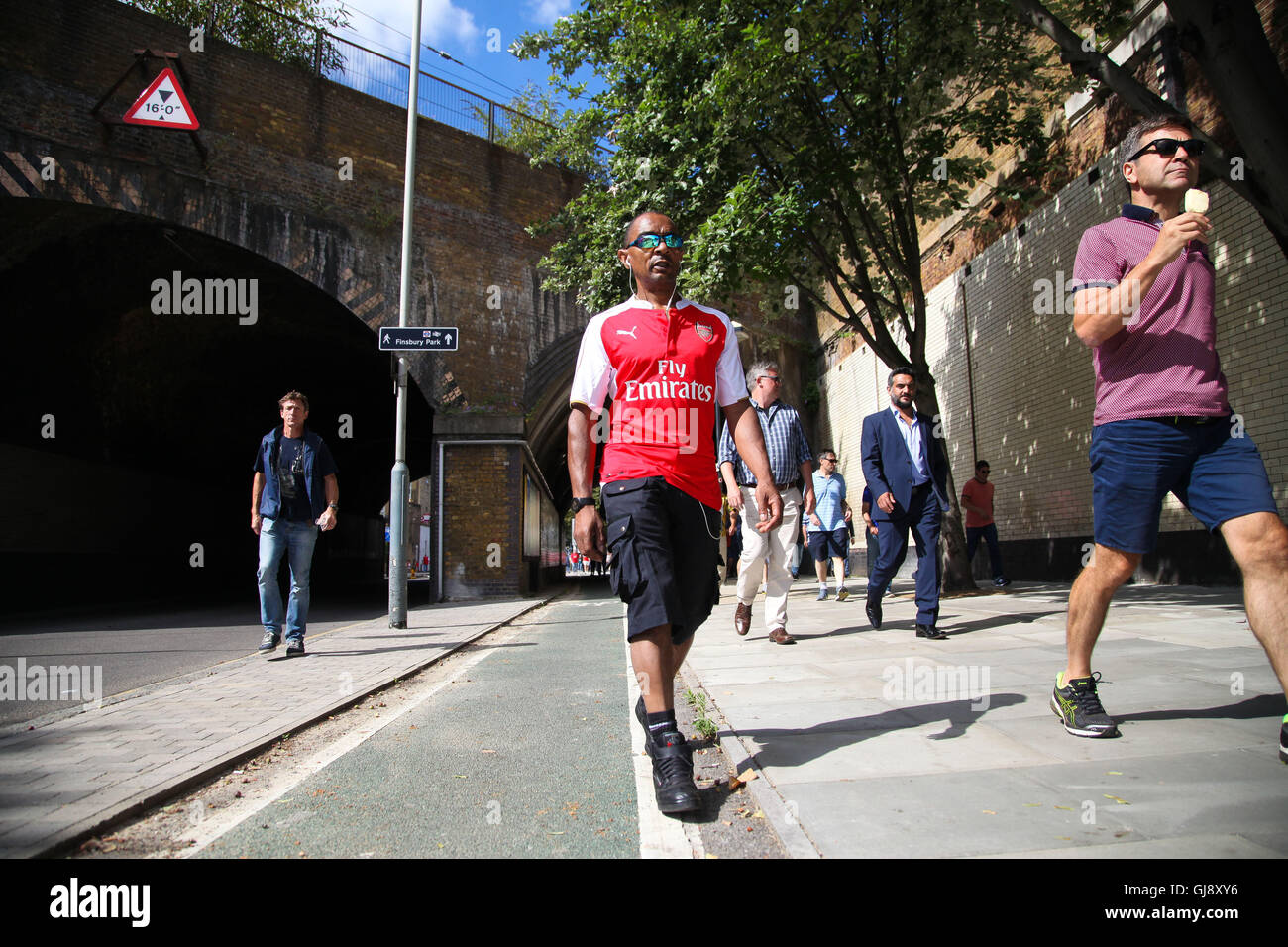 Emirates Stadium, North London, UK. 14th Aug, 2016. Football fans at ...