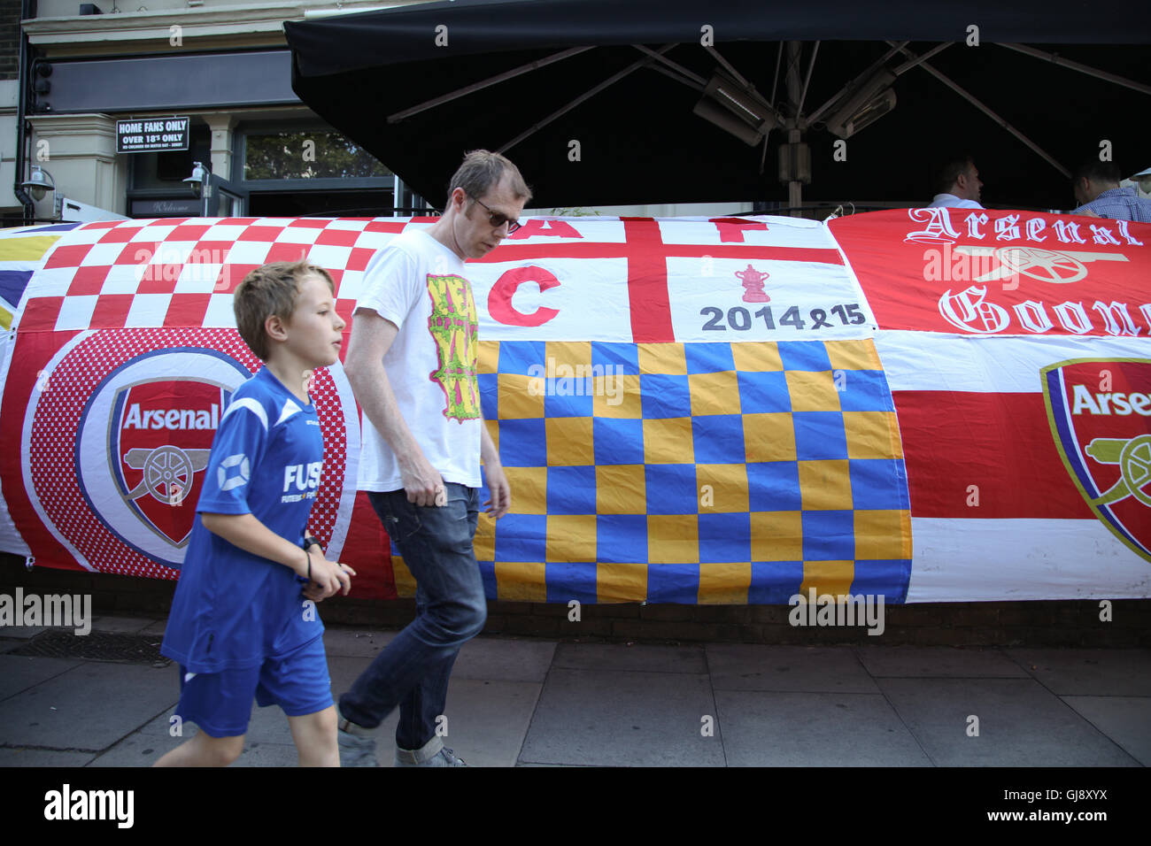Emirates Stadium, North London, UK. 14th Aug, 2016. Football fans at ...