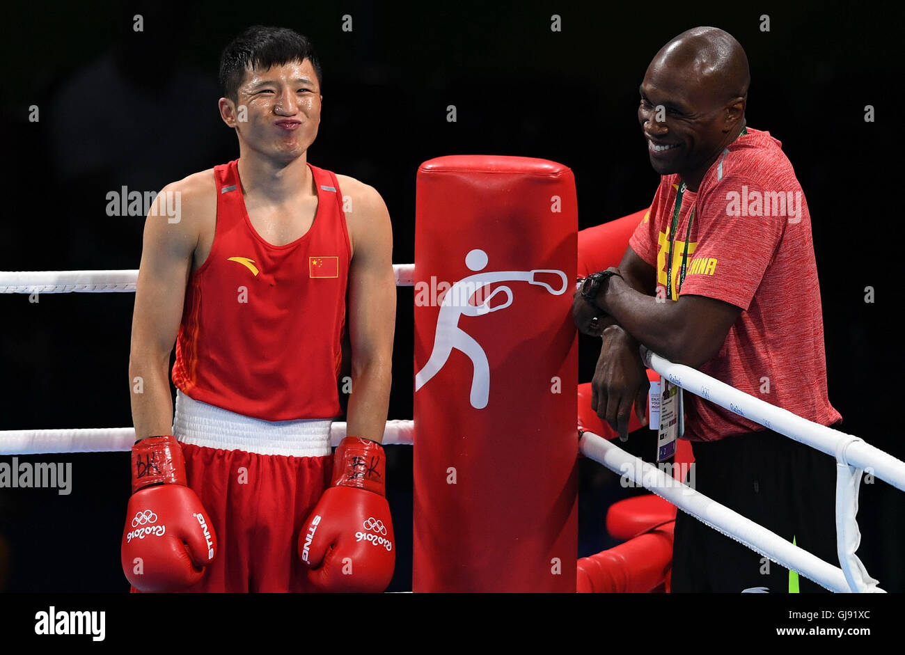 Rio De Janeiro, Brazil. 14th Aug, 2016. China's Zhang Jiawei (L) reacts prior to the men's ...