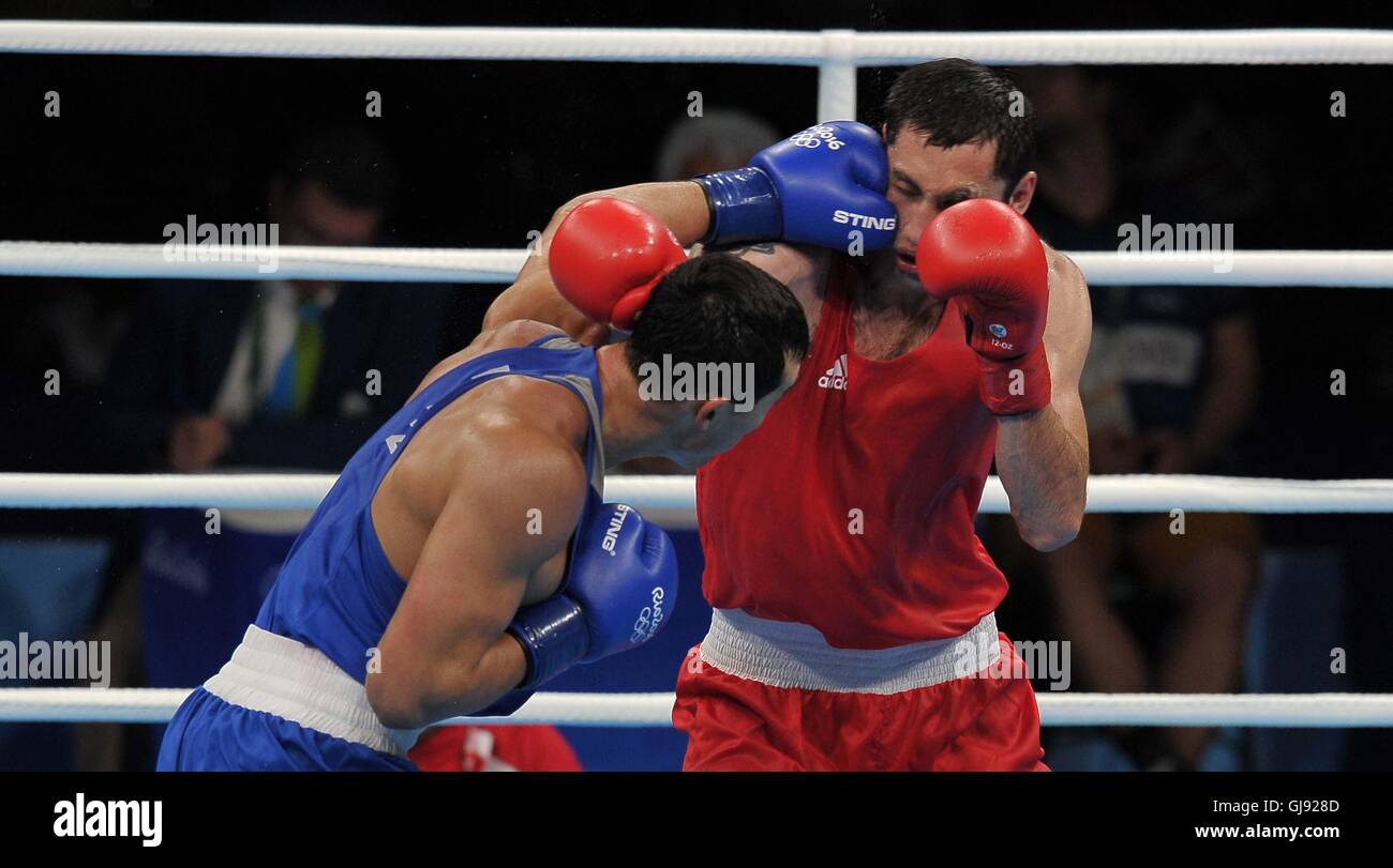 Teymur Mammadov (AZE, red) and Adilbek Niyazymbetov (KAZ). Boxing ...