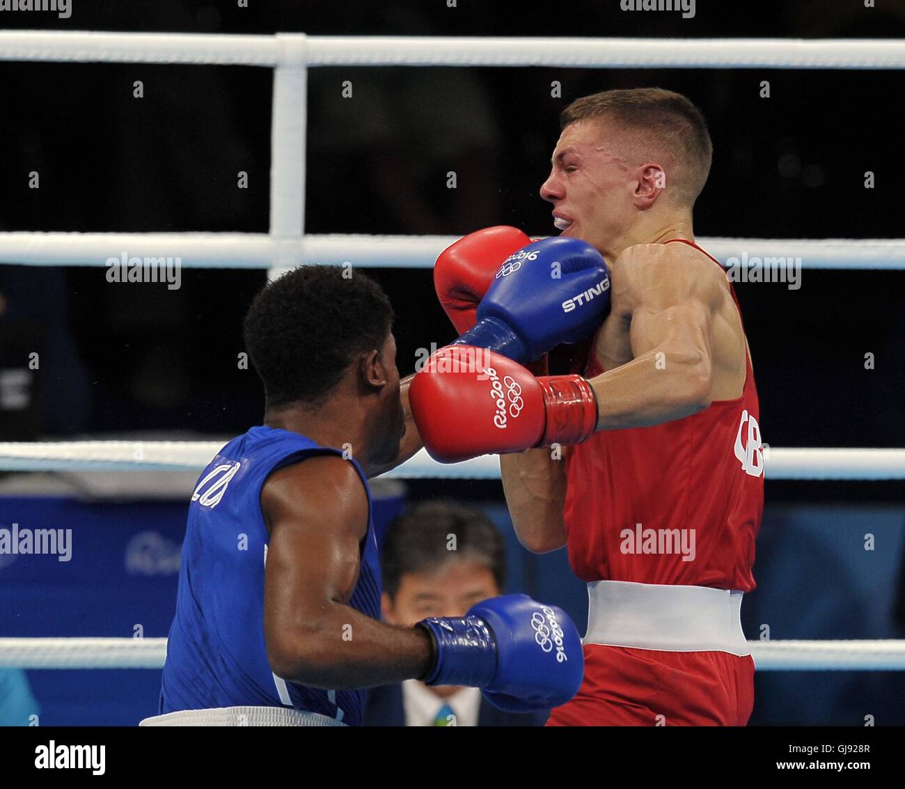 Pat McCormack (GBR, red) and Yasnier Toledo (CUB). Boxing. Riocentro 6 ...