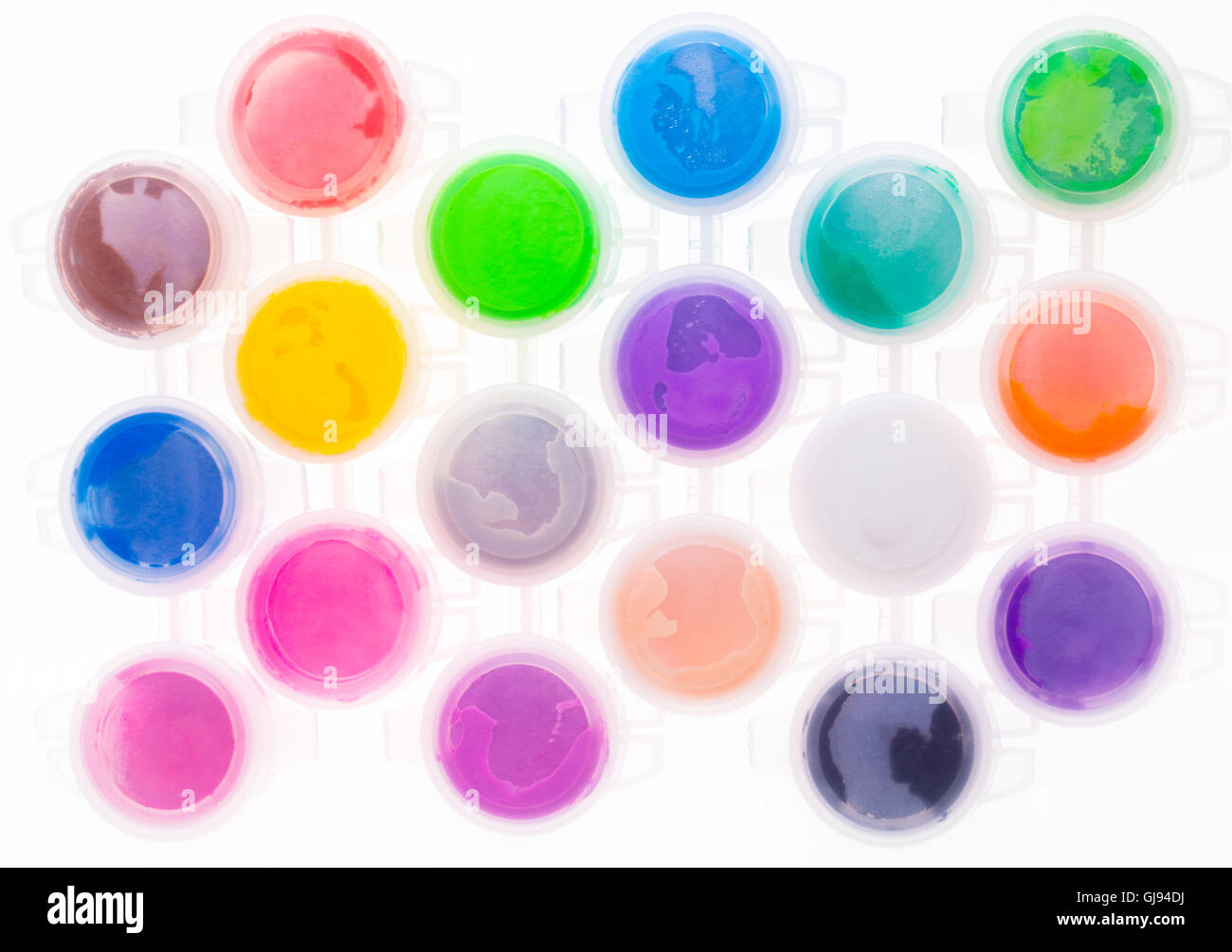 set of multi-colored paint on a white background Stock Photo - Alamy