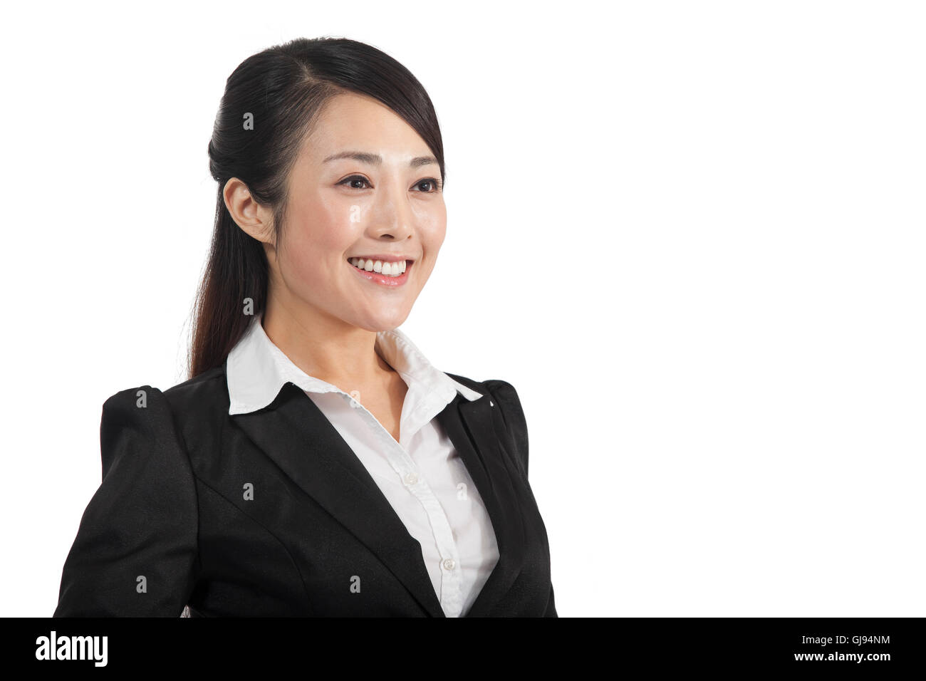 Business lady smiling studio shot Stock Photo - Alamy