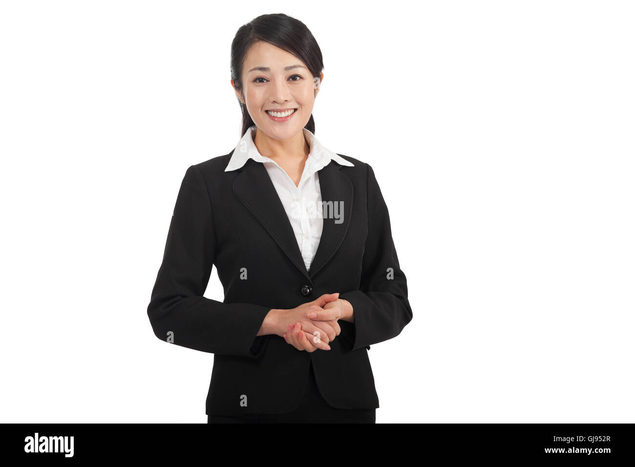Business lady standing studio shot Stock Photo - Alamy