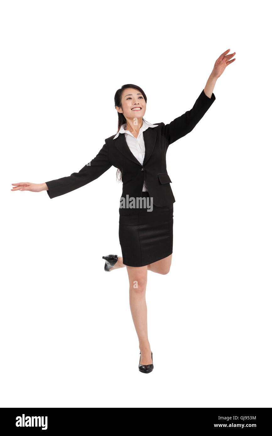 Happy business woman dancing full Cut Out Stock Images & Pictures - Alamy