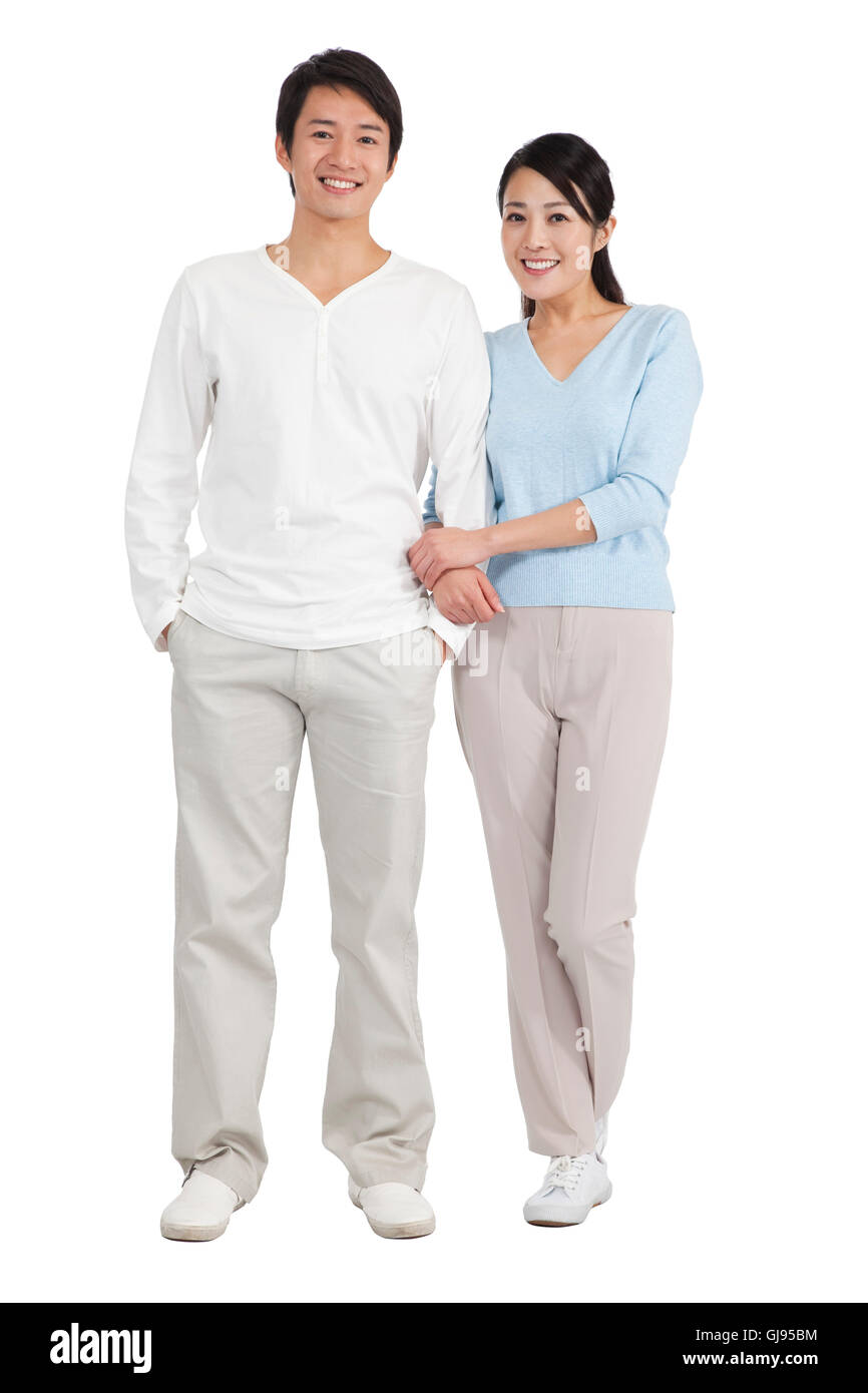 Studio shot casual couple Handle Stock Photo - Alamy