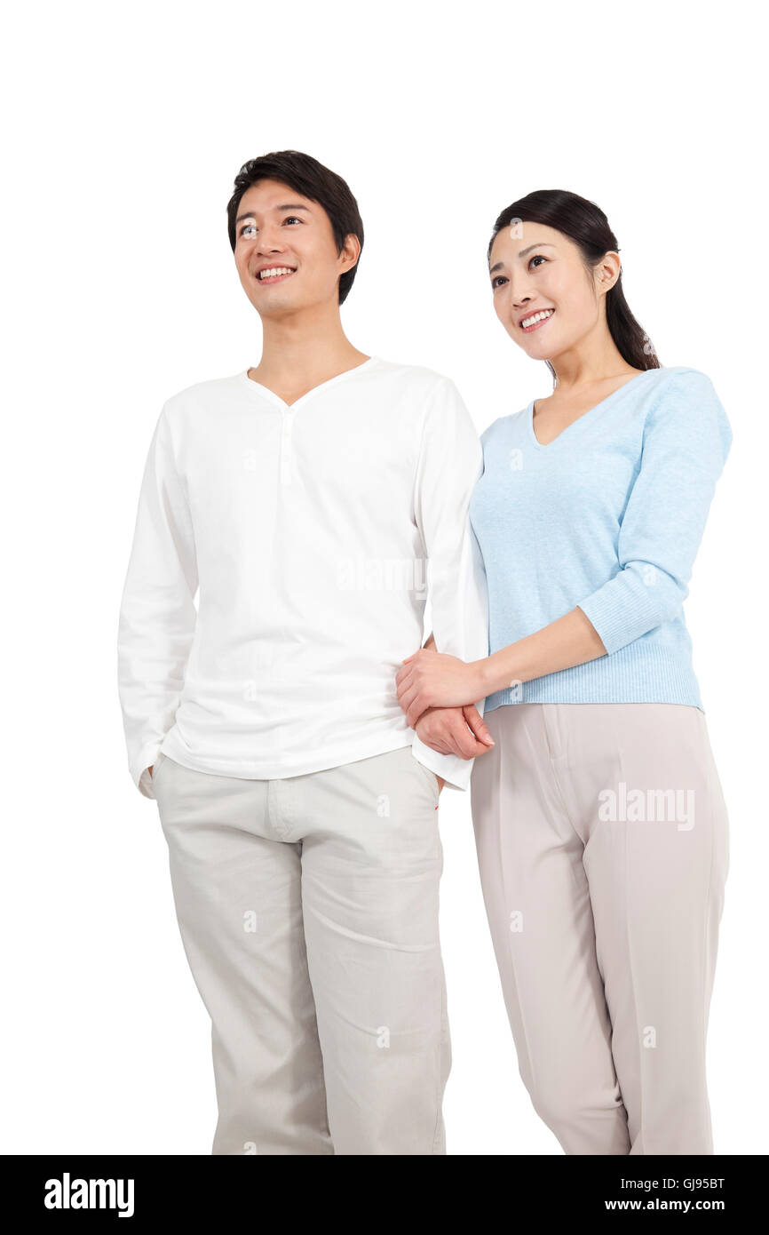 Studio shot casual couple Handle Stock Photo - Alamy