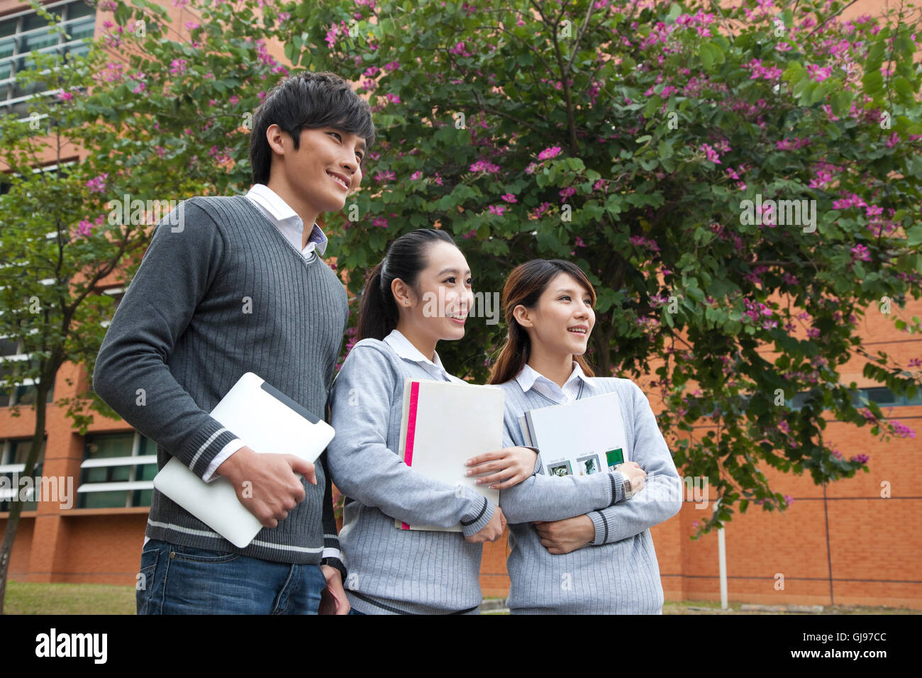 Young university student campus stroll Stock Photo - Alamy