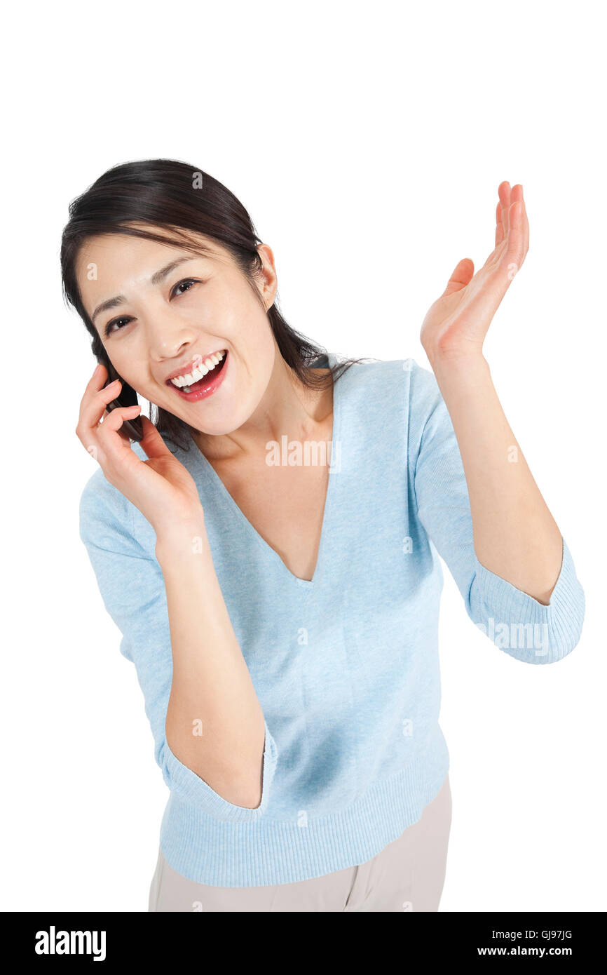 Young woman studio shot casual call Stock Photo - Alamy