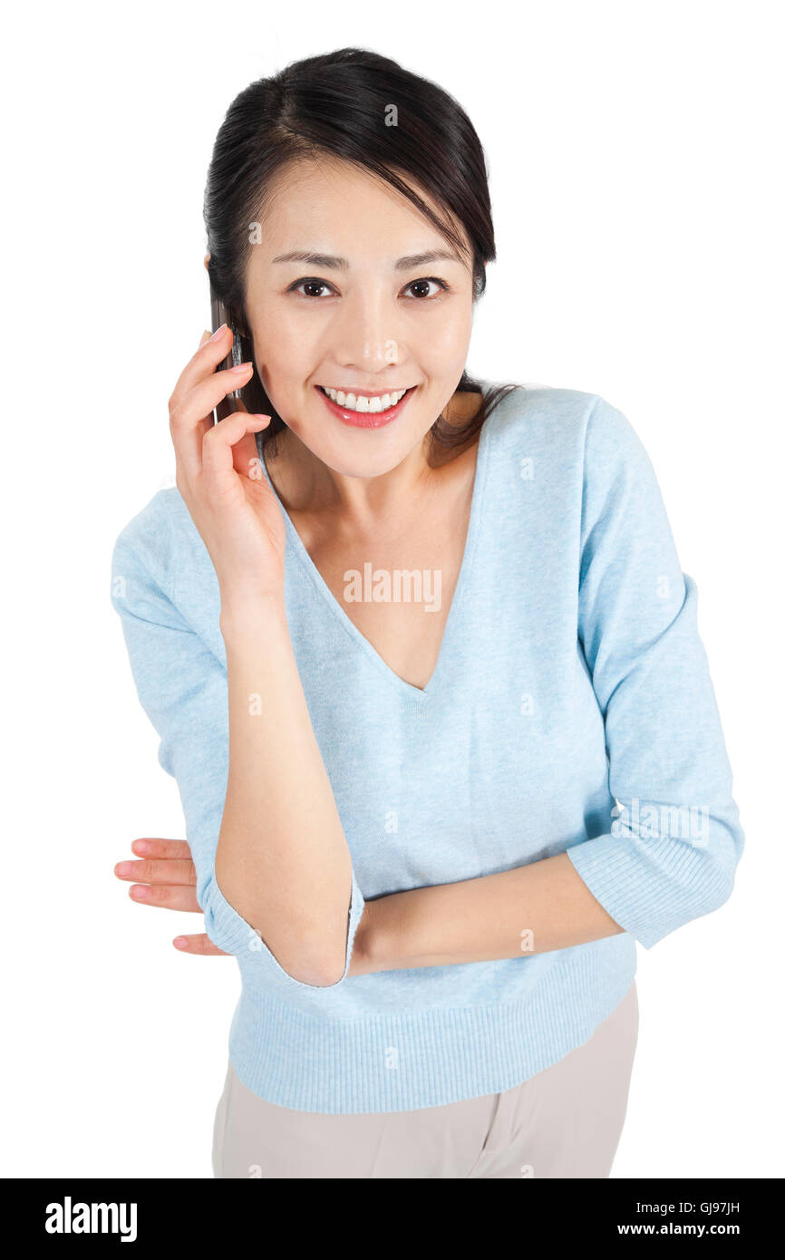 Young woman studio shot casual call Stock Photo - Alamy