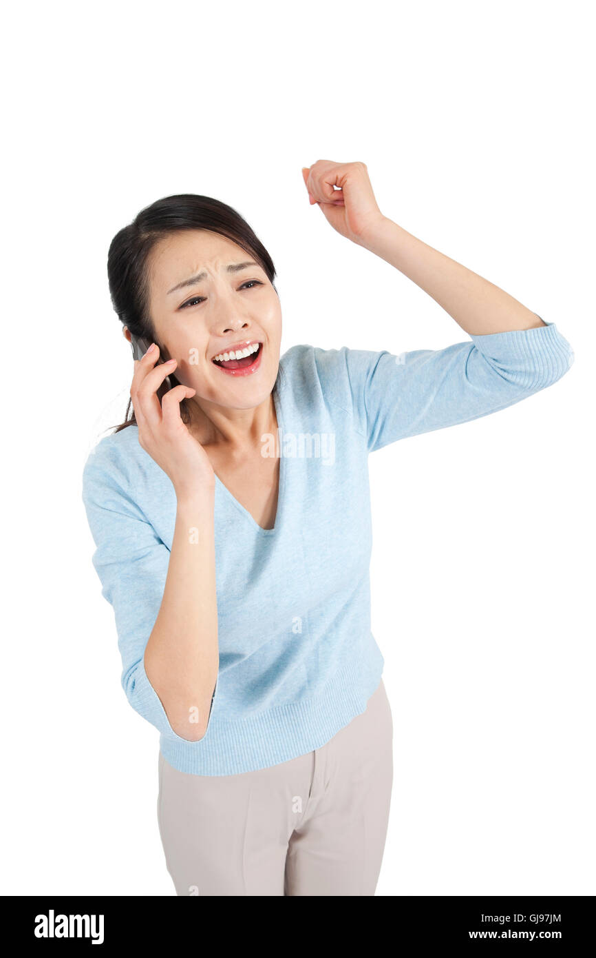 Young woman studio shot casual call Stock Photo - Alamy