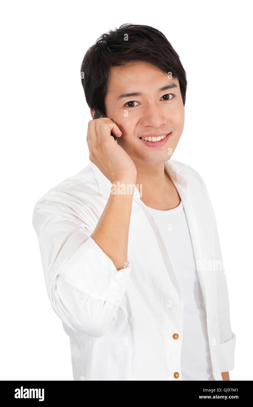 Studio shot Young casual man calling Stock Photo - Alamy