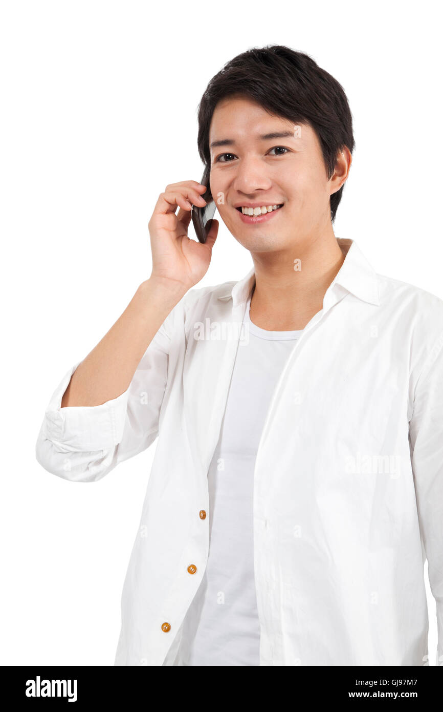Studio shot Young casual man calling Stock Photo - Alamy