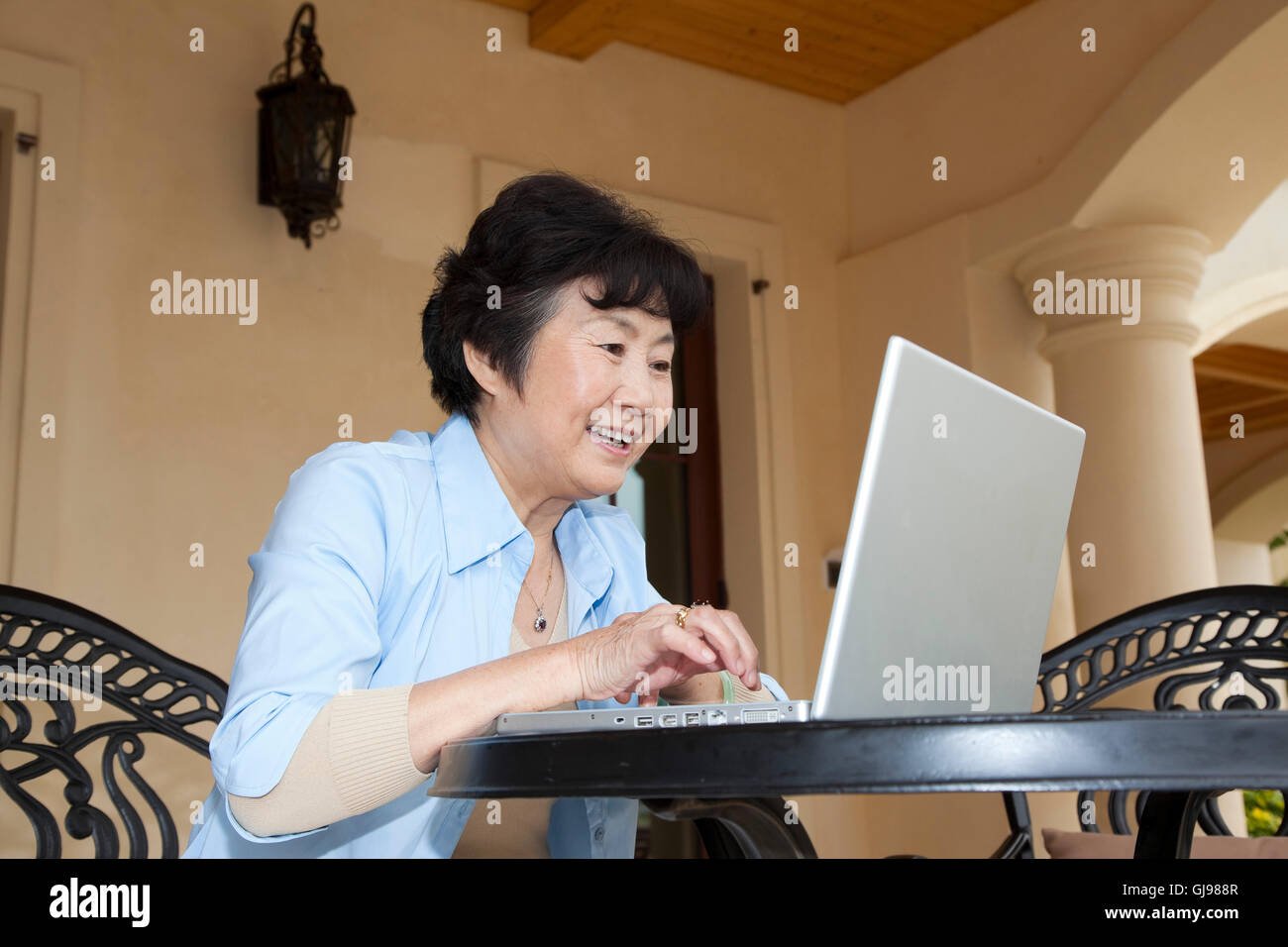 Old woman at resort hotel Internet Stock Photo - Alamy