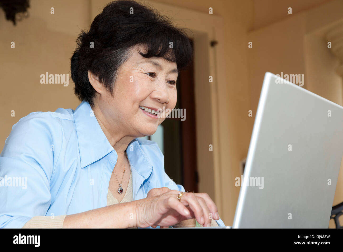 Old woman at resort hotel Internet Stock Photo - Alamy