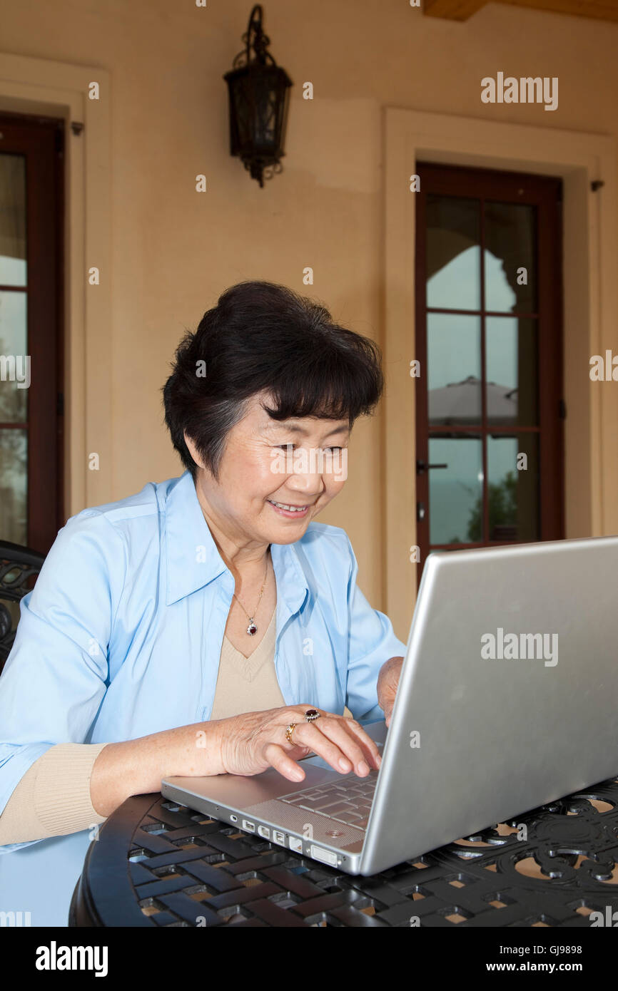 Old woman at resort hotel Internet Stock Photo - Alamy