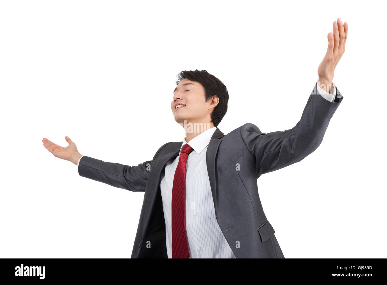 Studio shot business attire Young man with open arms Stock Photo - Alamy