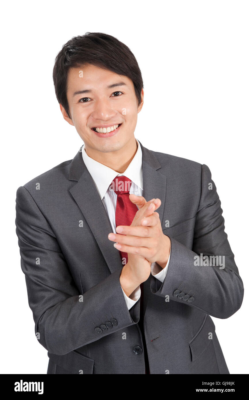 Studio shot business attire Young man clapping Stock Photo - Alamy