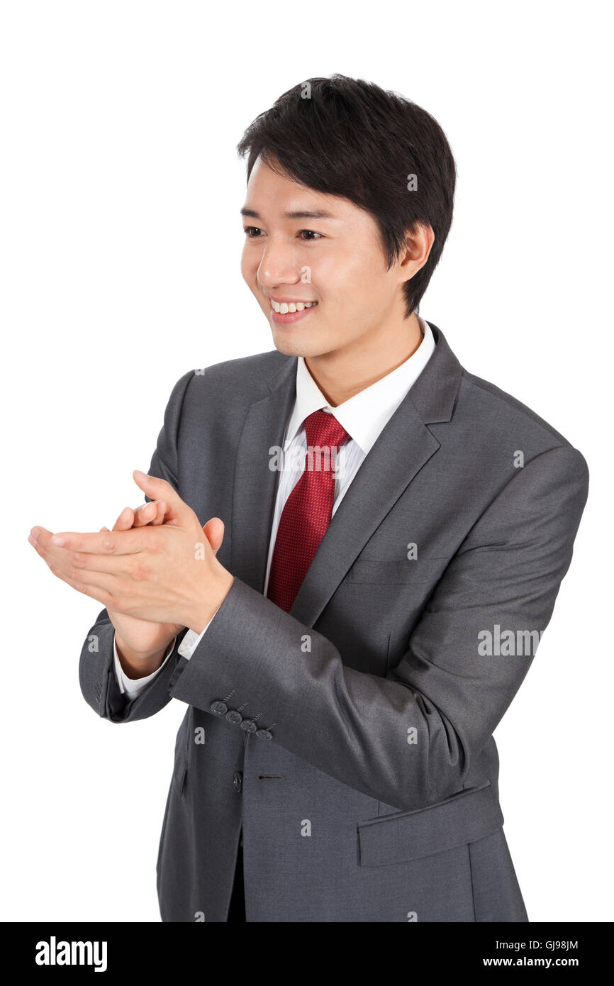 Studio shot business attire Young man clapping Stock Photo - Alamy