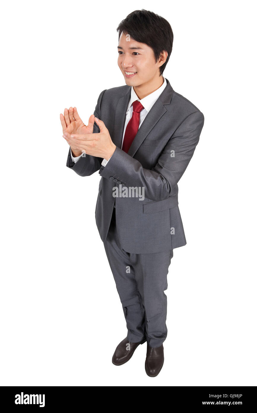 Studio shot business attire Young man clapping Stock Photo - Alamy