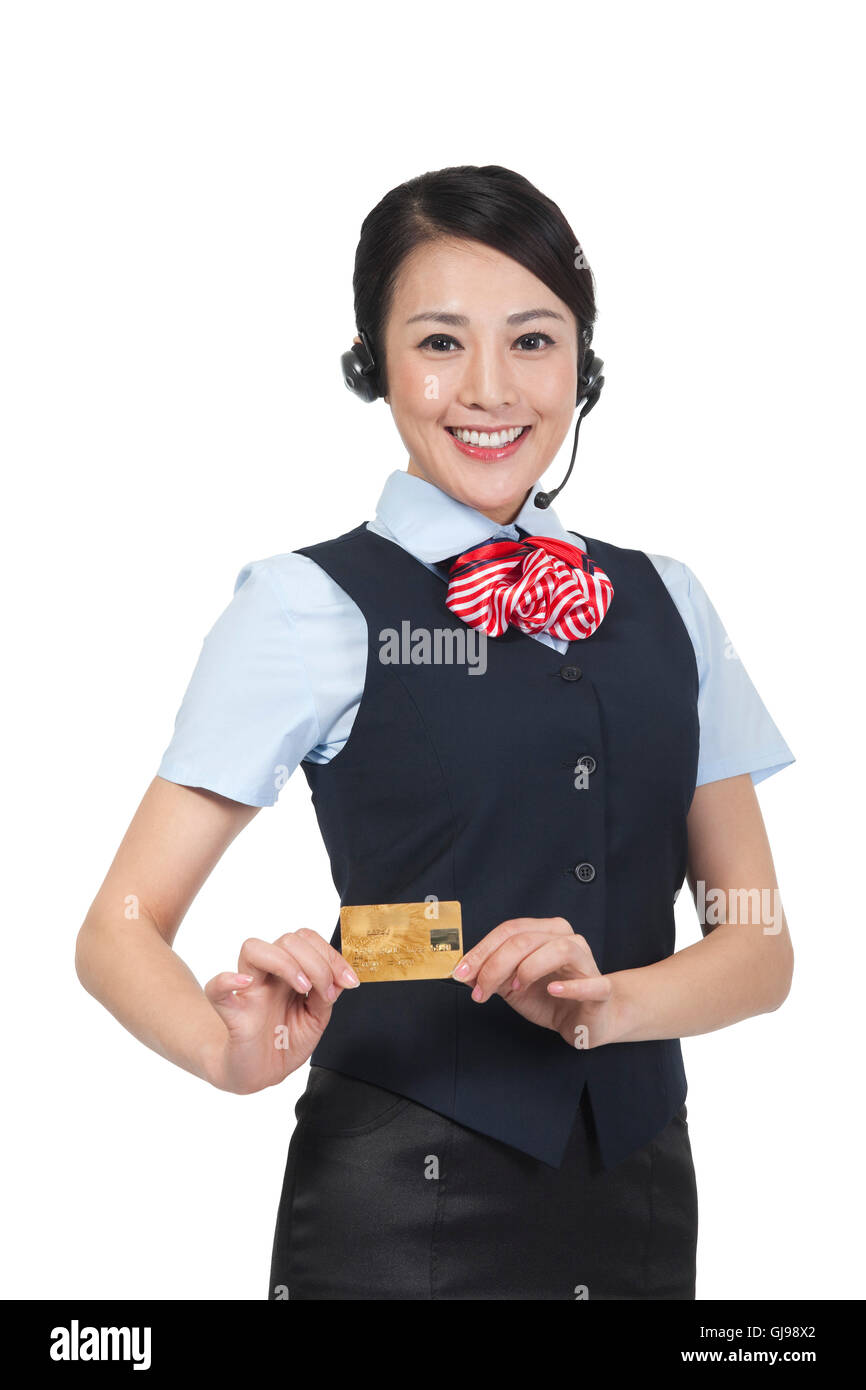 Studio shot young female operator display card Stock Photo - Alamy