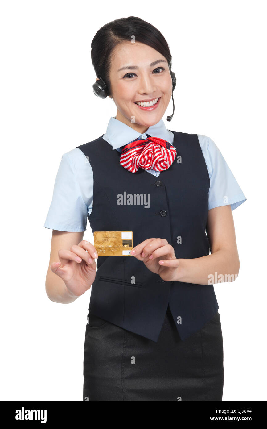 Studio shot young female operator display card Stock Photo - Alamy